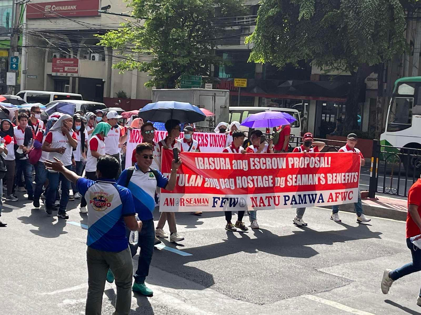 » Labor groups hold massive rally